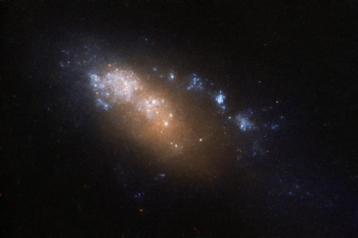 Hubble's Dwarf-Sized Double-Named Galaxy [IMAGE] | EurekAlert! Science ...