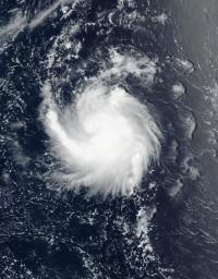 NASA sees formation of comma-shaped Tropical Storm 14W | EurekAlert!